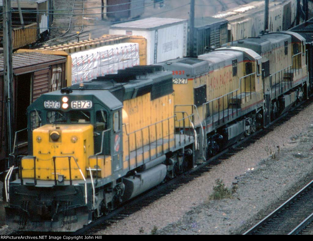 1382-13 Eastbkund CNW coal train passes MILW Pigs Eye Yard